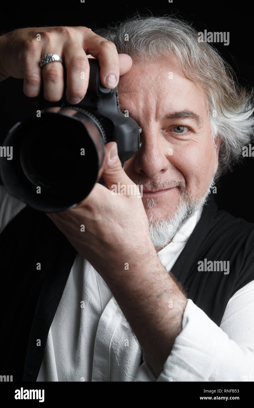 A professional photographer Stock Photo - Alamy