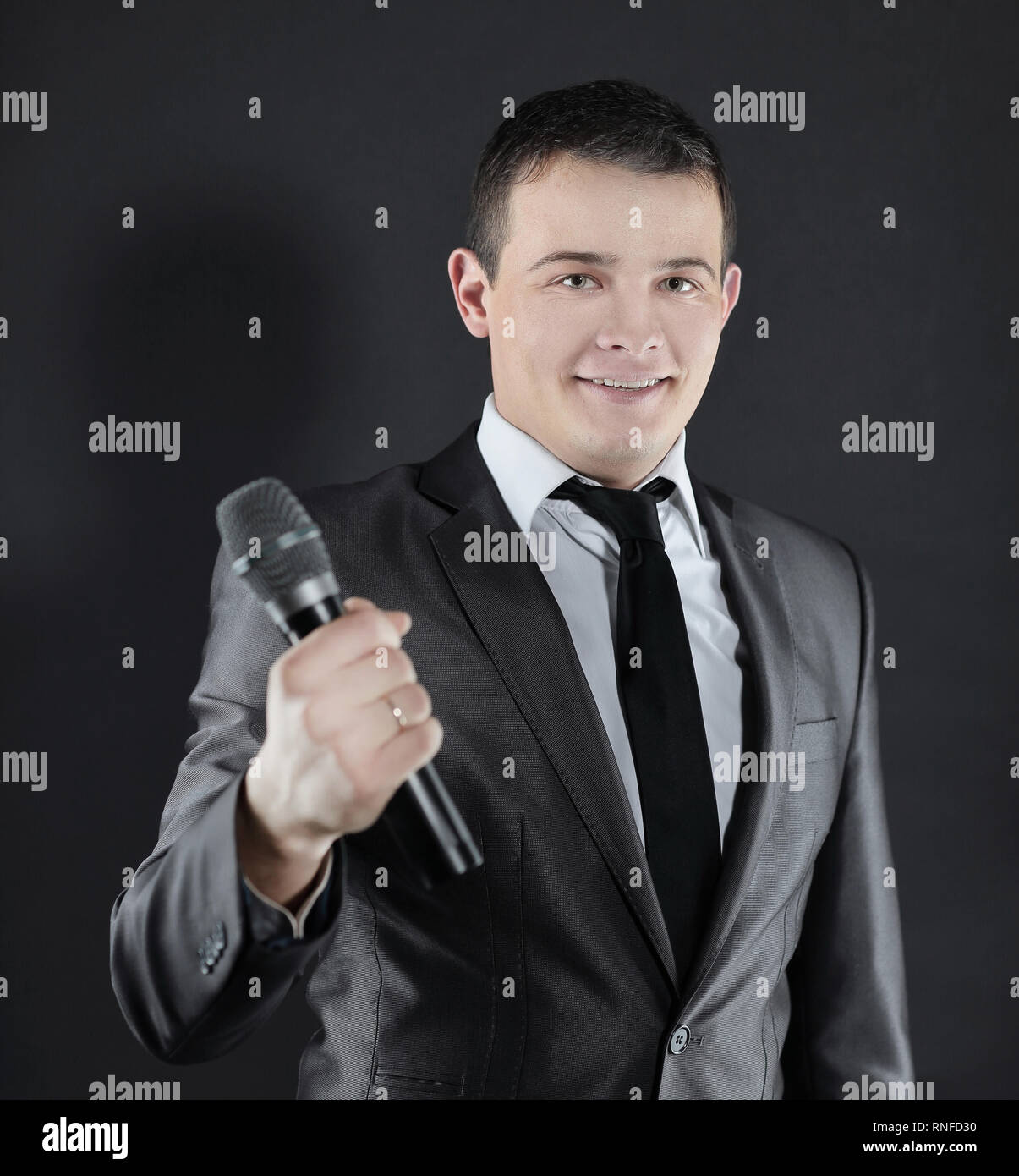 Young male journalist interviewing man hi-res stock photography and ...