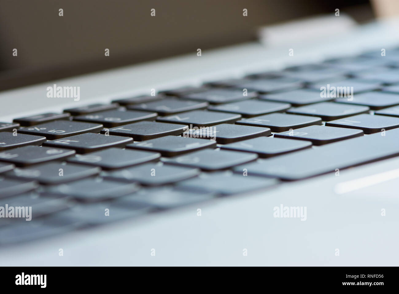 macro color photo of a black laptop keyboard with blurred keys Stock ...