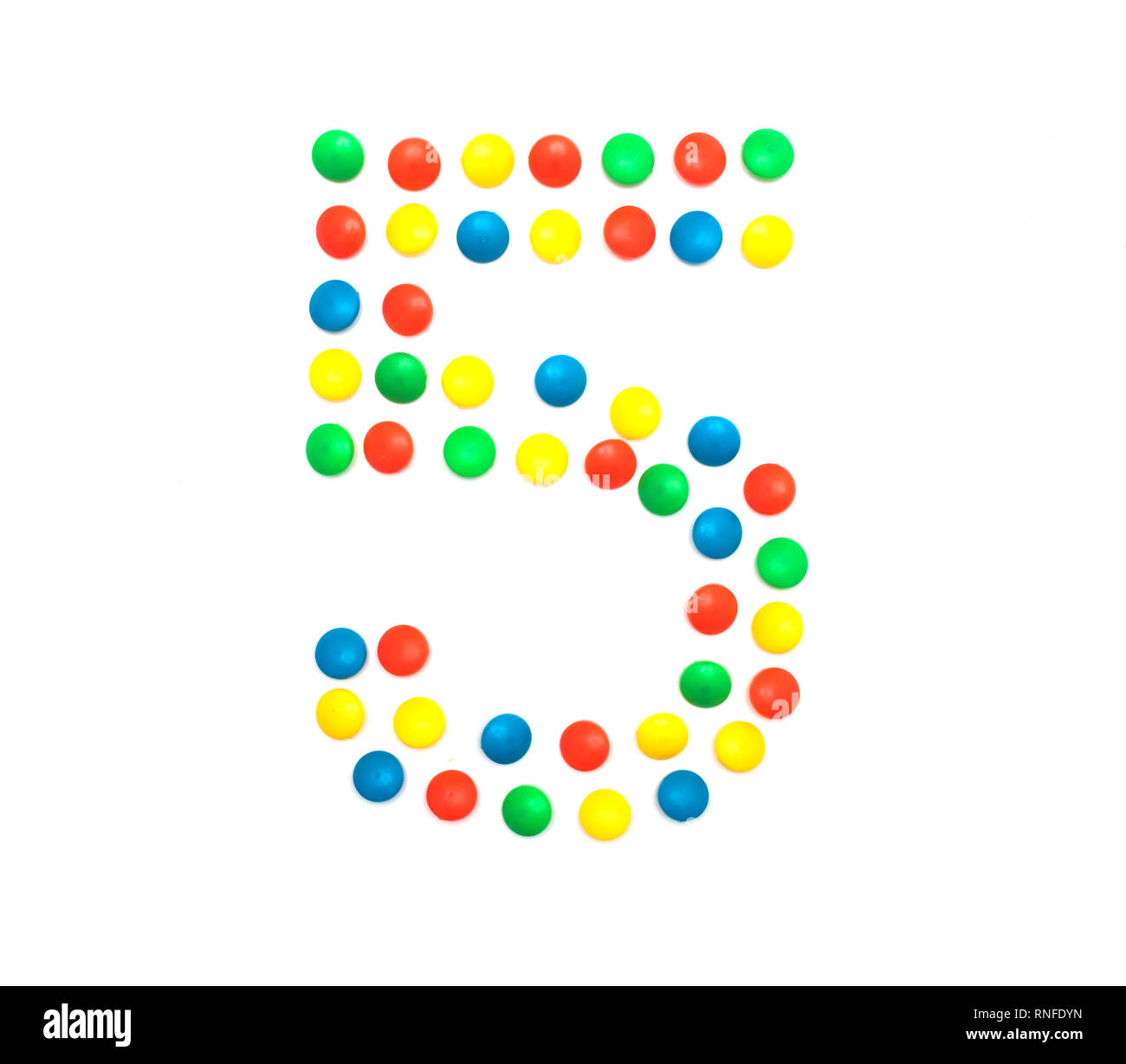 Children's numbers laid out from a multi-colored mosaic figure number 5 ...