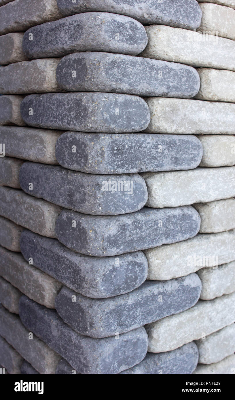 Modern brown brick column, background texture, closeup Stock Photo - Alamy