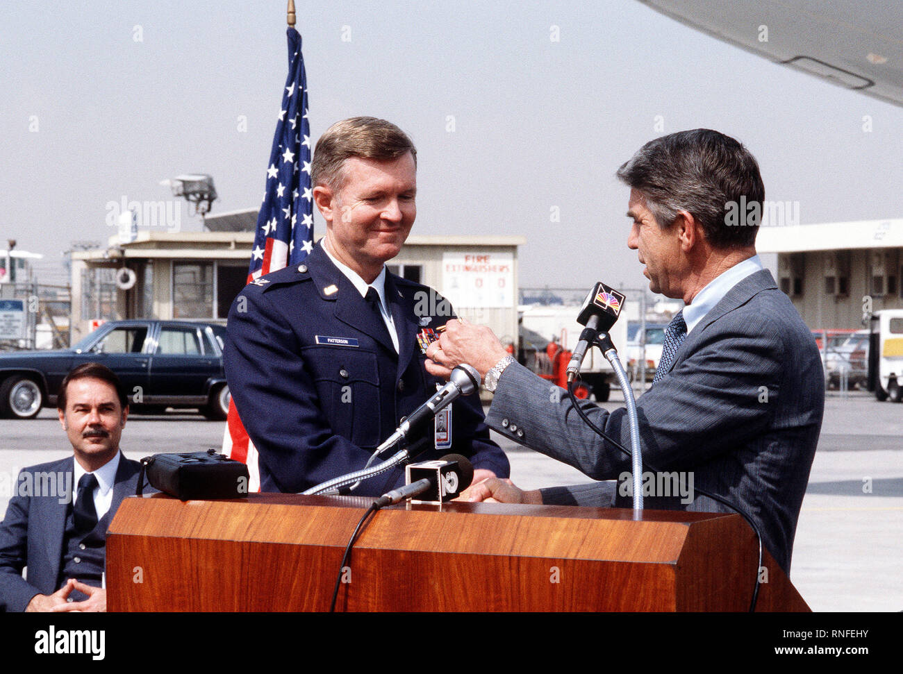 COL John Patterson, Air Force plant representative, accepts the keys ...