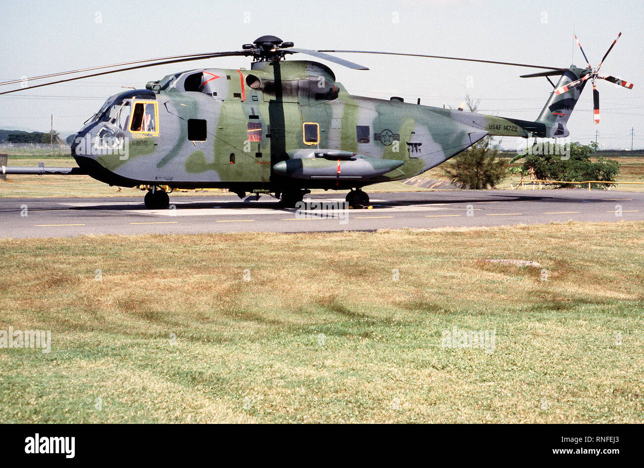 Left side view of a HH-3E Jolly Green Giant helicopter parked on the ...