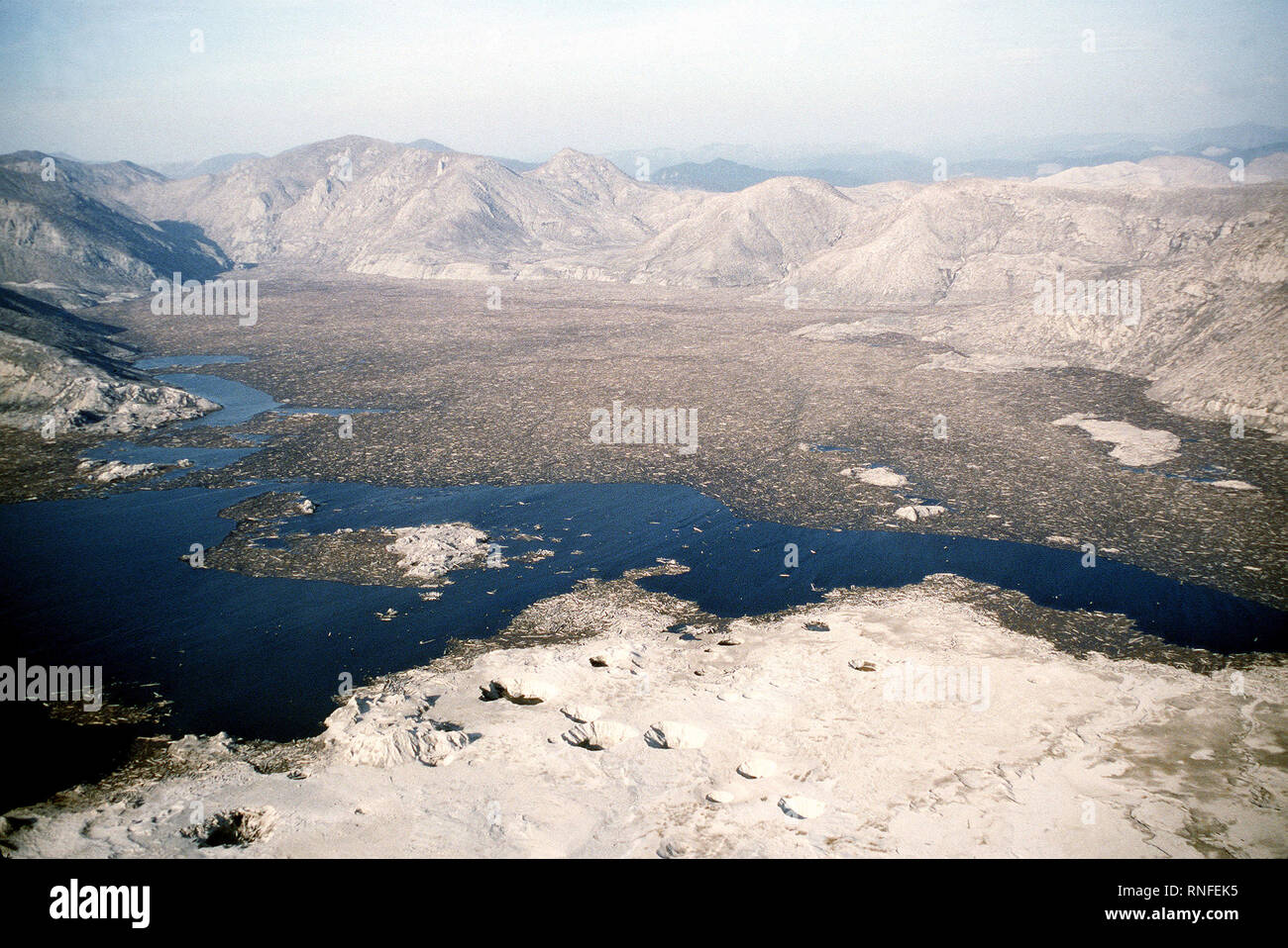 A view of lake partially filled with volcanic debris on the slopes of ...