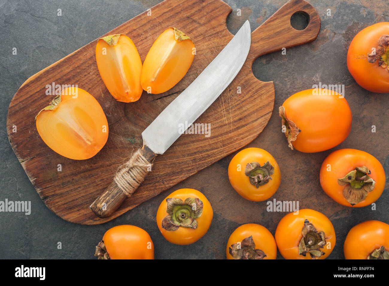 Top view cut persimmons hi-res stock photography and images - Alamy