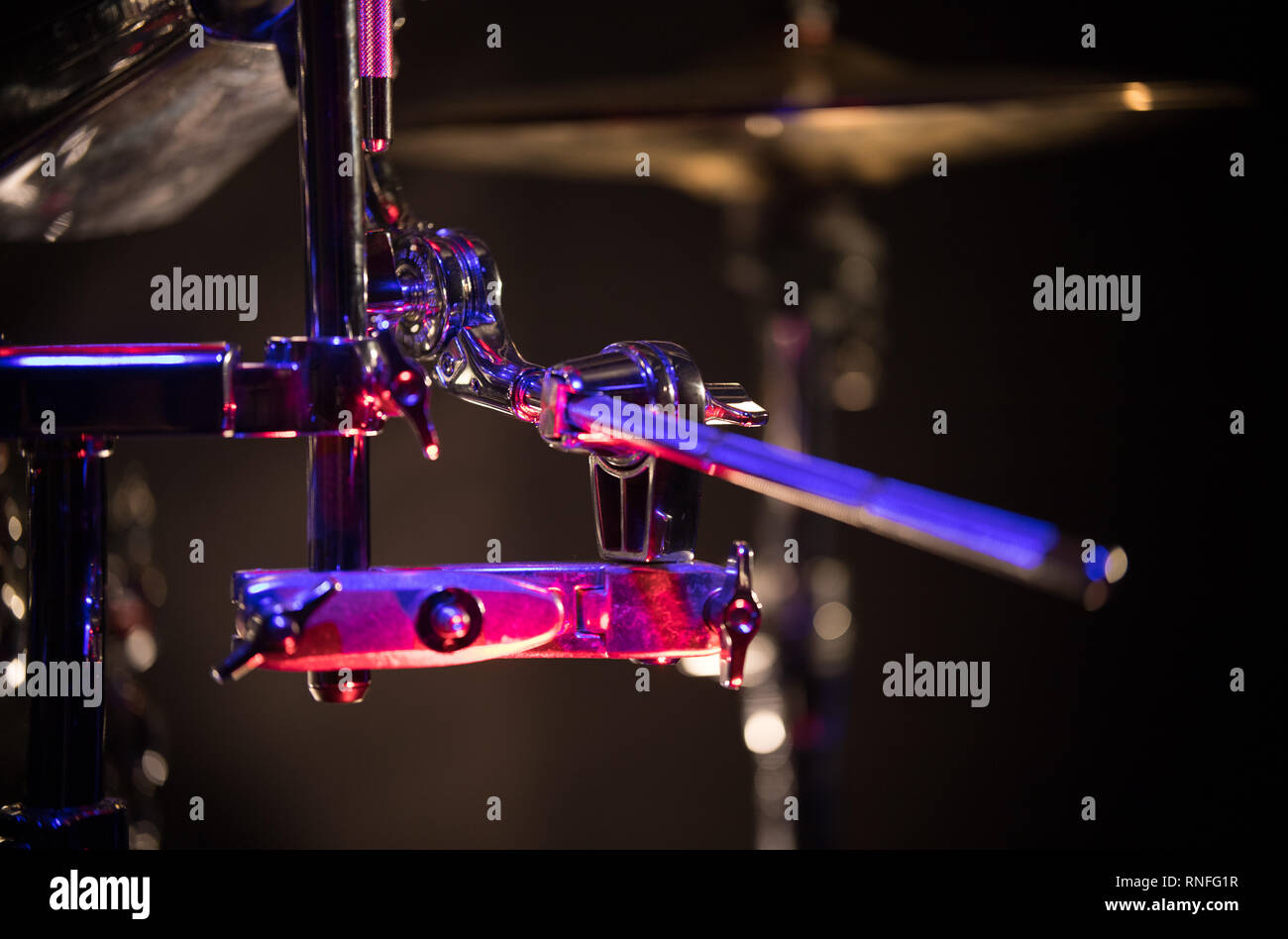 Modern drum set shot in dark neon studio Stock Photo - Alamy