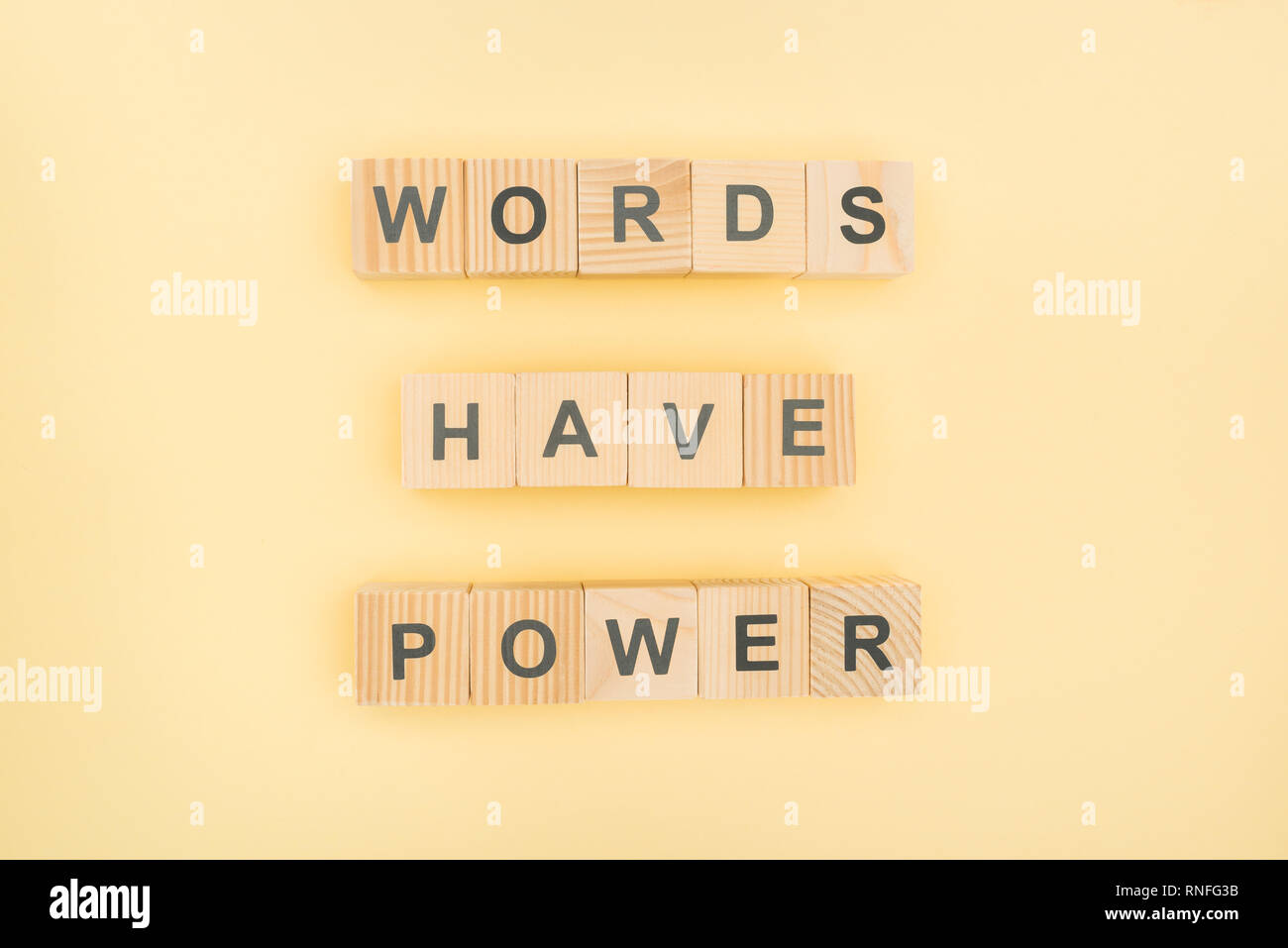 top view of phrase words have power lettering with wooden cubes on ...