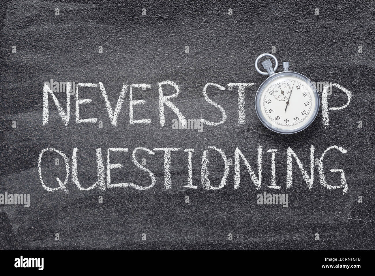never stop questioning written on chalkboard with vintage precise ...