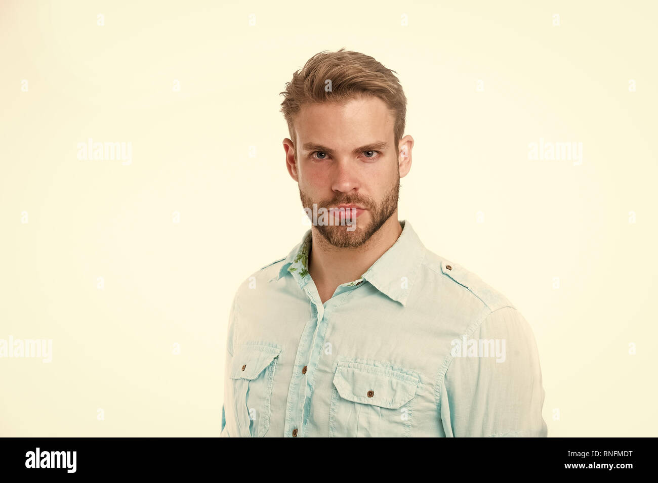 Man with bristle on strict face, isolated on white background. Man with ...