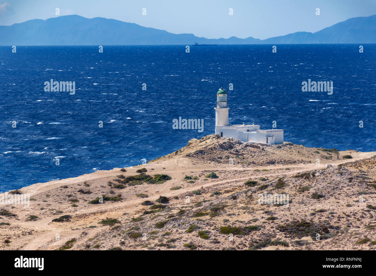 White lighthouse in Prasonisi National Park – southest spot of Island ...
