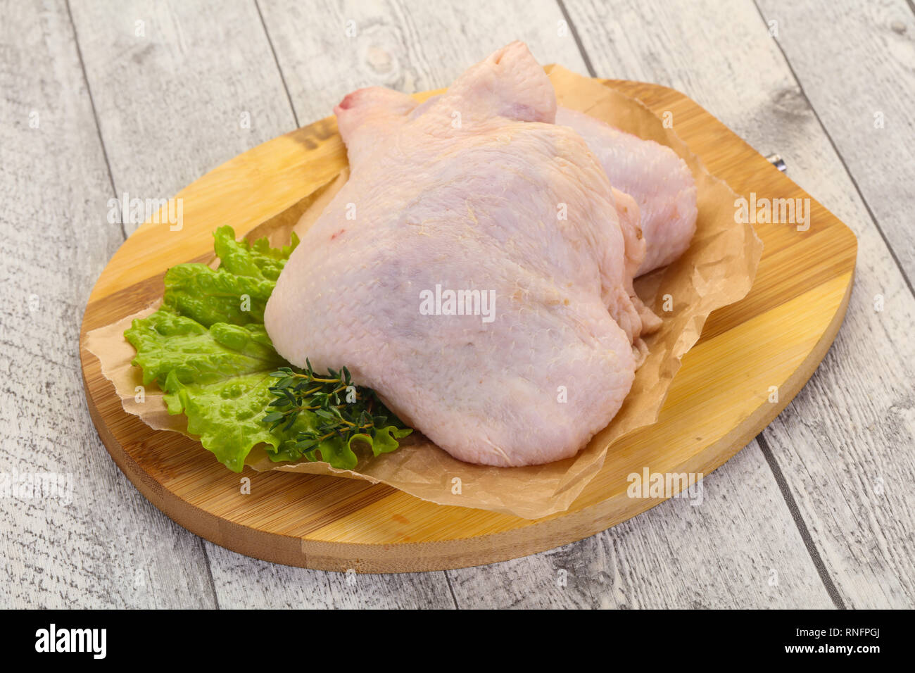 Raw chicken hip ready for cooking Stock Photo - Alamy