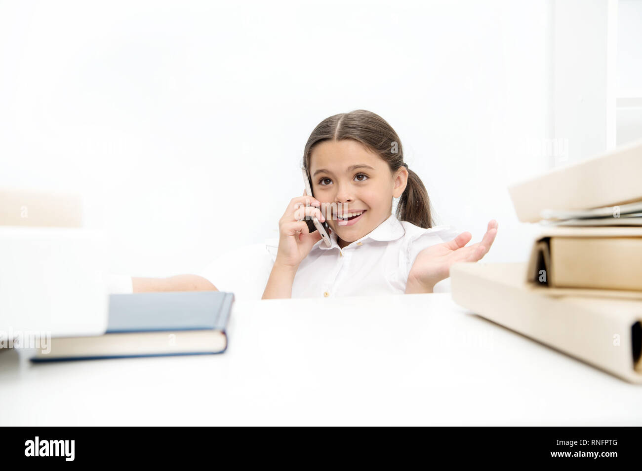 Using new communication technology in school education. Small girl ...