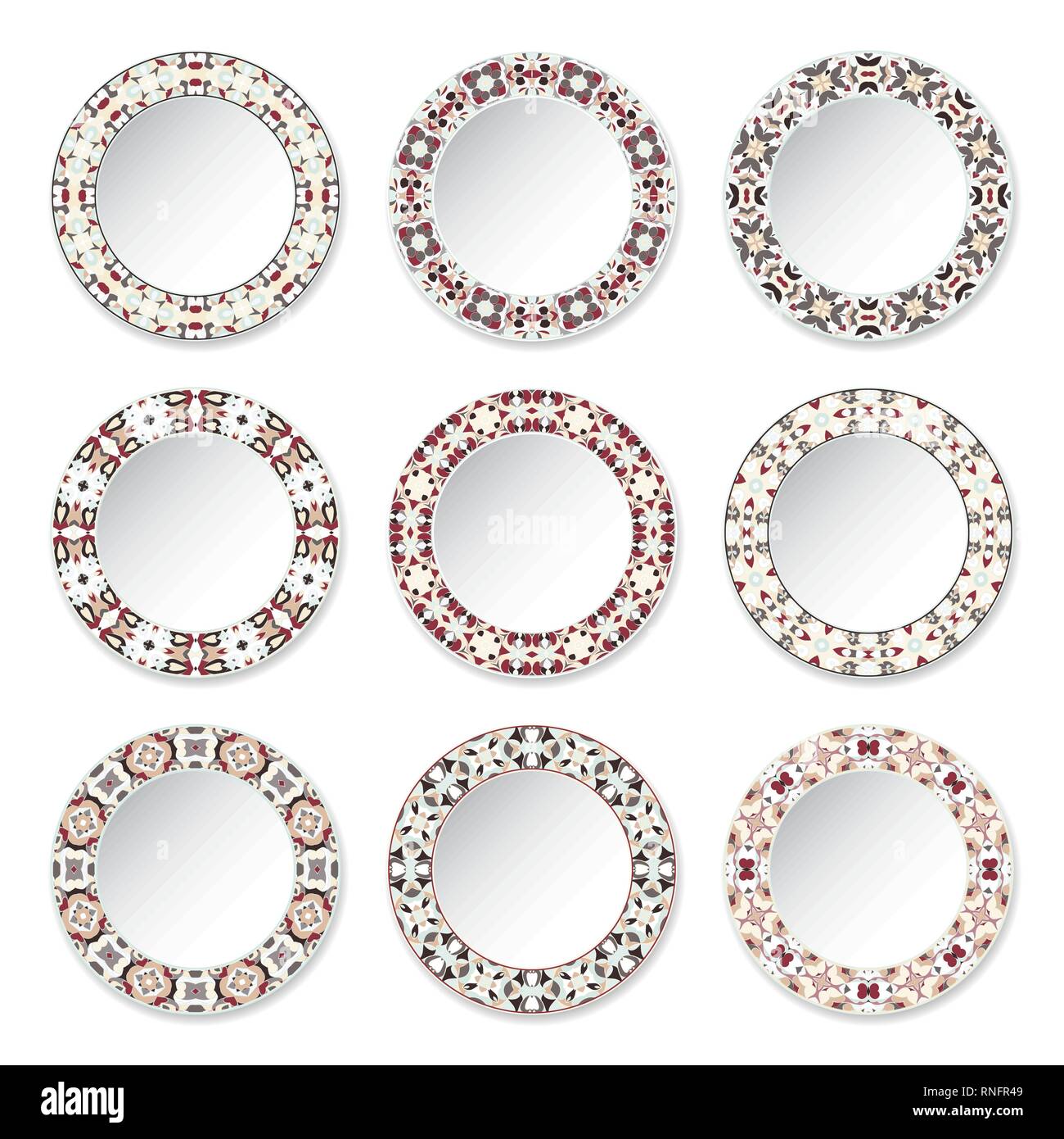 Set of decorative plates with a circular red pattern, top view. White ...