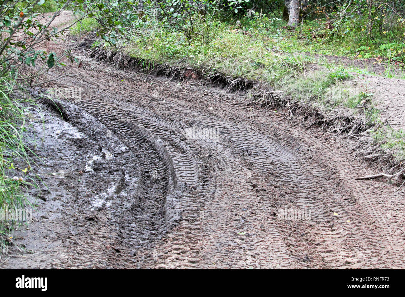 Muddy tracks trail bike hi-res stock photography and images - Alamy
