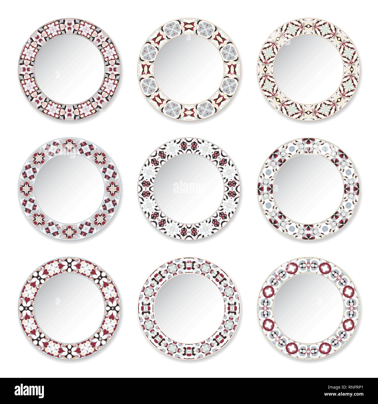 Set of decorative plates with a circular red pattern, top view. White ...