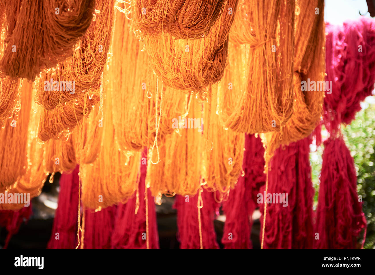 Fabric hanging from bamboo poles hi-res stock photography and images ...