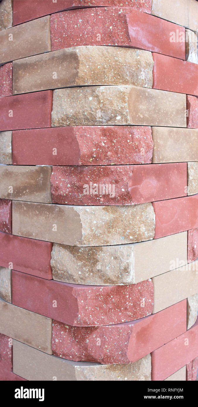 Multicolored modern brick column with red, close-up, texture, backdrop ...
