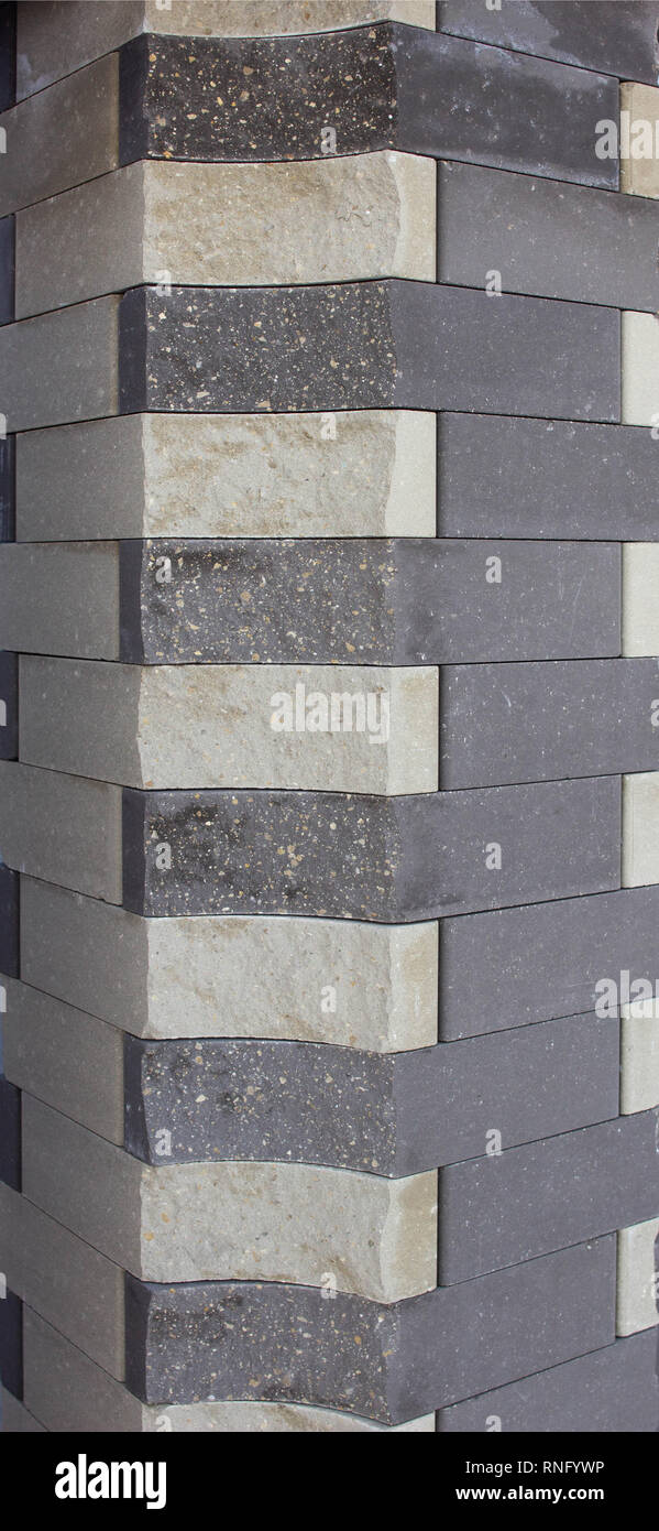 Modern brick column with brown and gray bricks, designer, texture ...