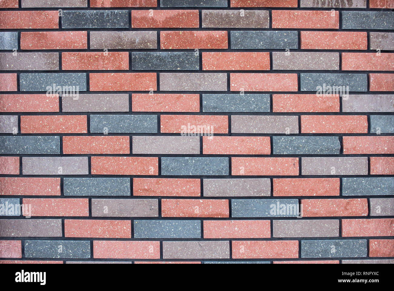 Modern designer multicolored brick wall, background, texture ...