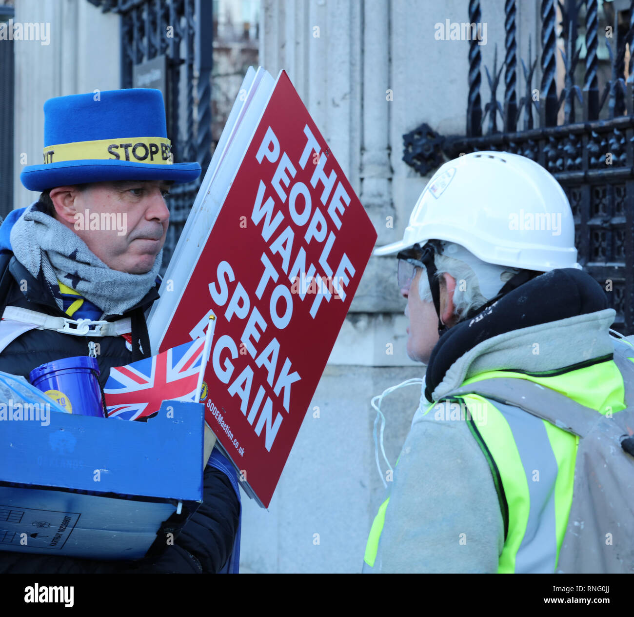 An anti and pro Brexit campaigner, arguing outside the House of ...