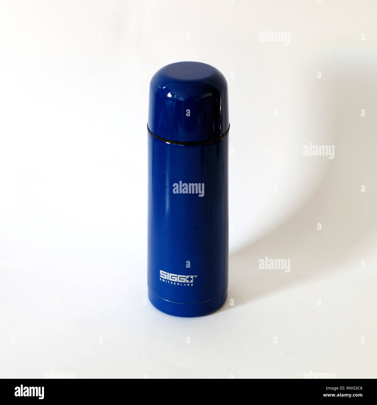 Stainless steel thermos blue color, isolated with white background ...