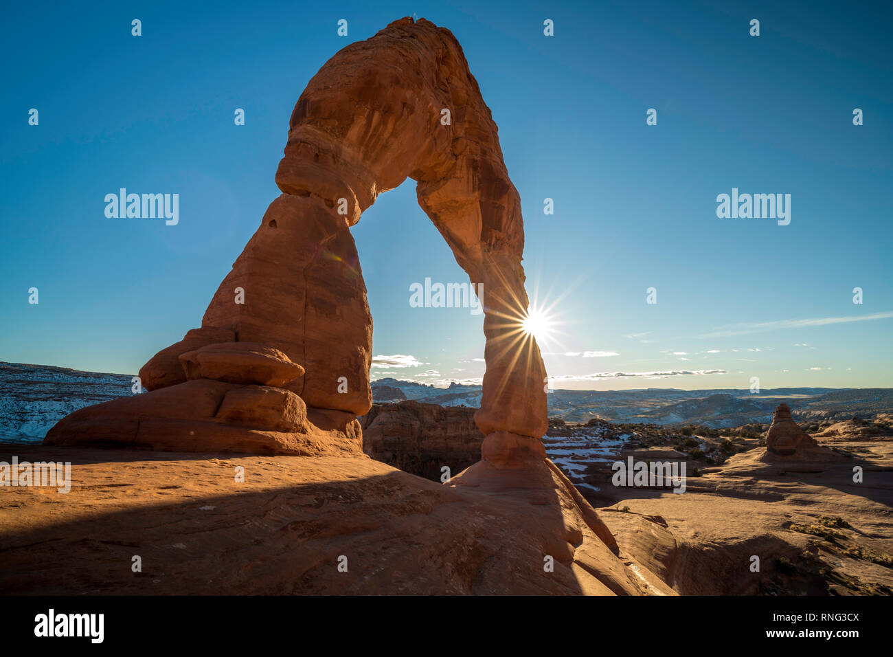 Unique rock arch in Utahs Arches National Park with a sun star Stock ...