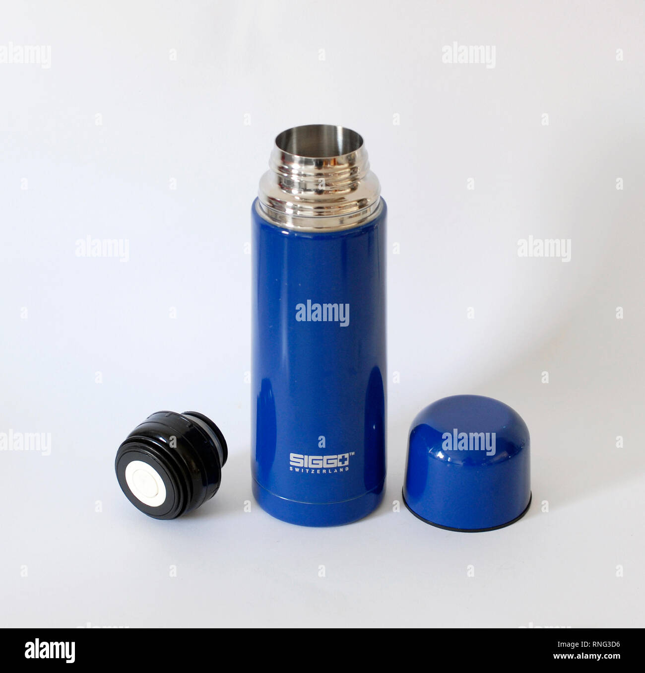 Stainless steel thermos blue color, isolated with white background ...