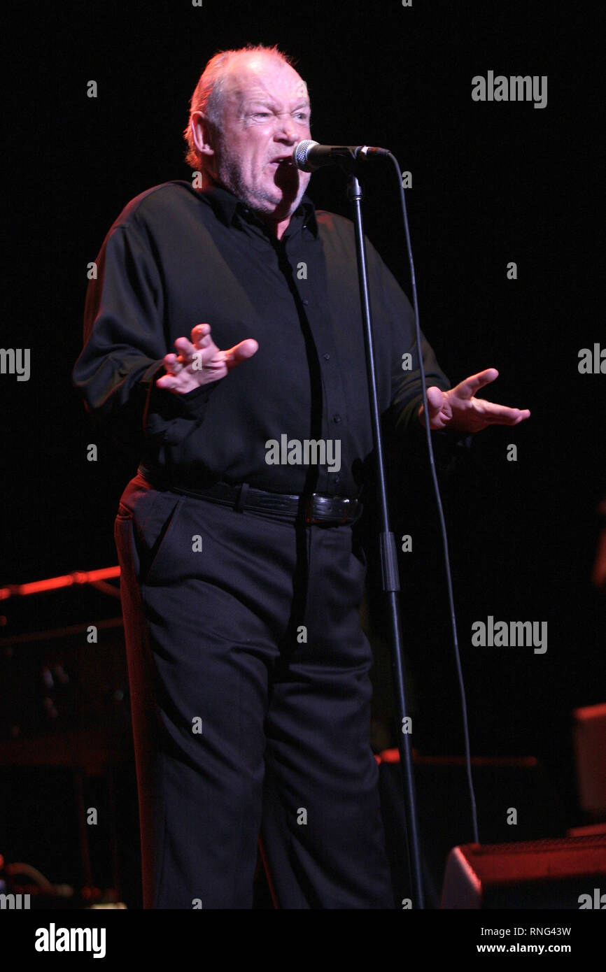 Singer Joe Cocker is shown on stage performing during "live" concert ...