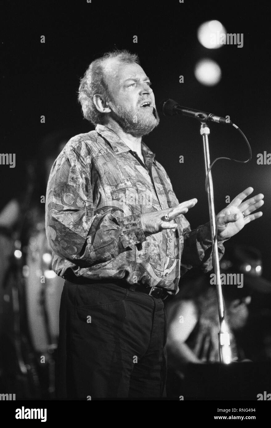 Singer Joe Cocker is shown performing on stage during a "live" concert ...