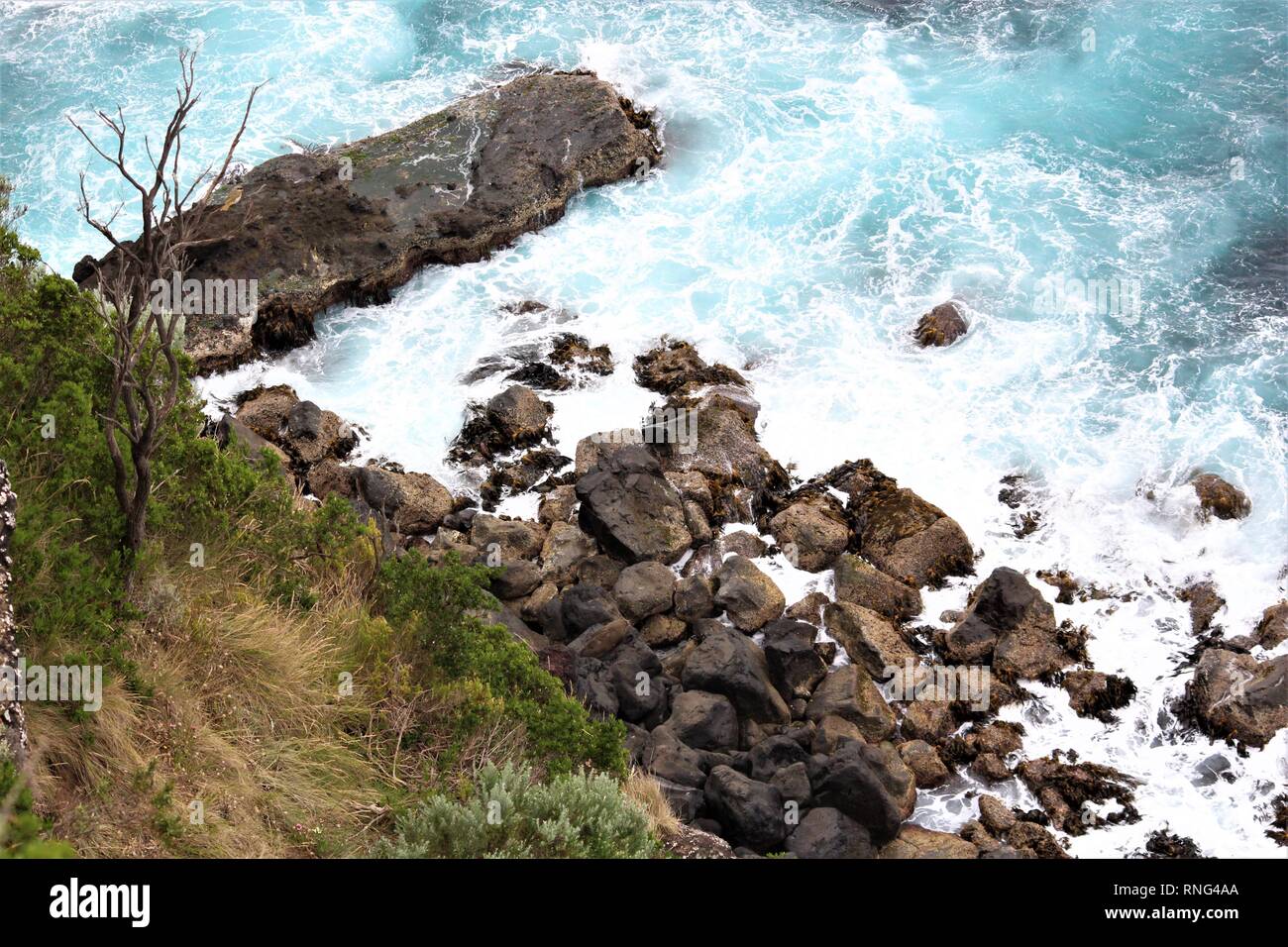 Wave foam at the bottom of a cliff hi-res stock photography and images ...
