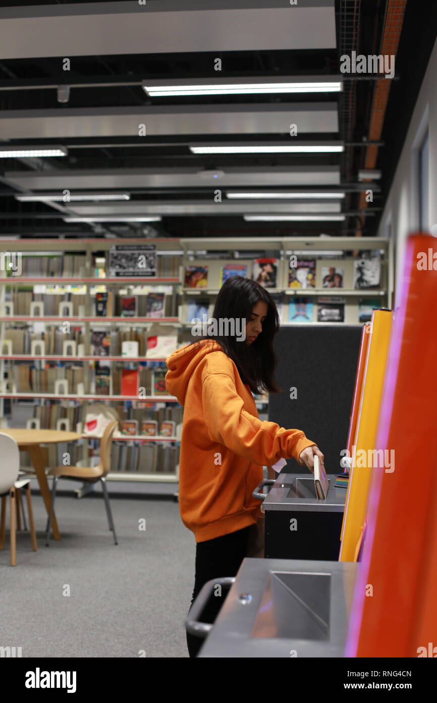 Returning book library hi-res stock photography and images - Alamy