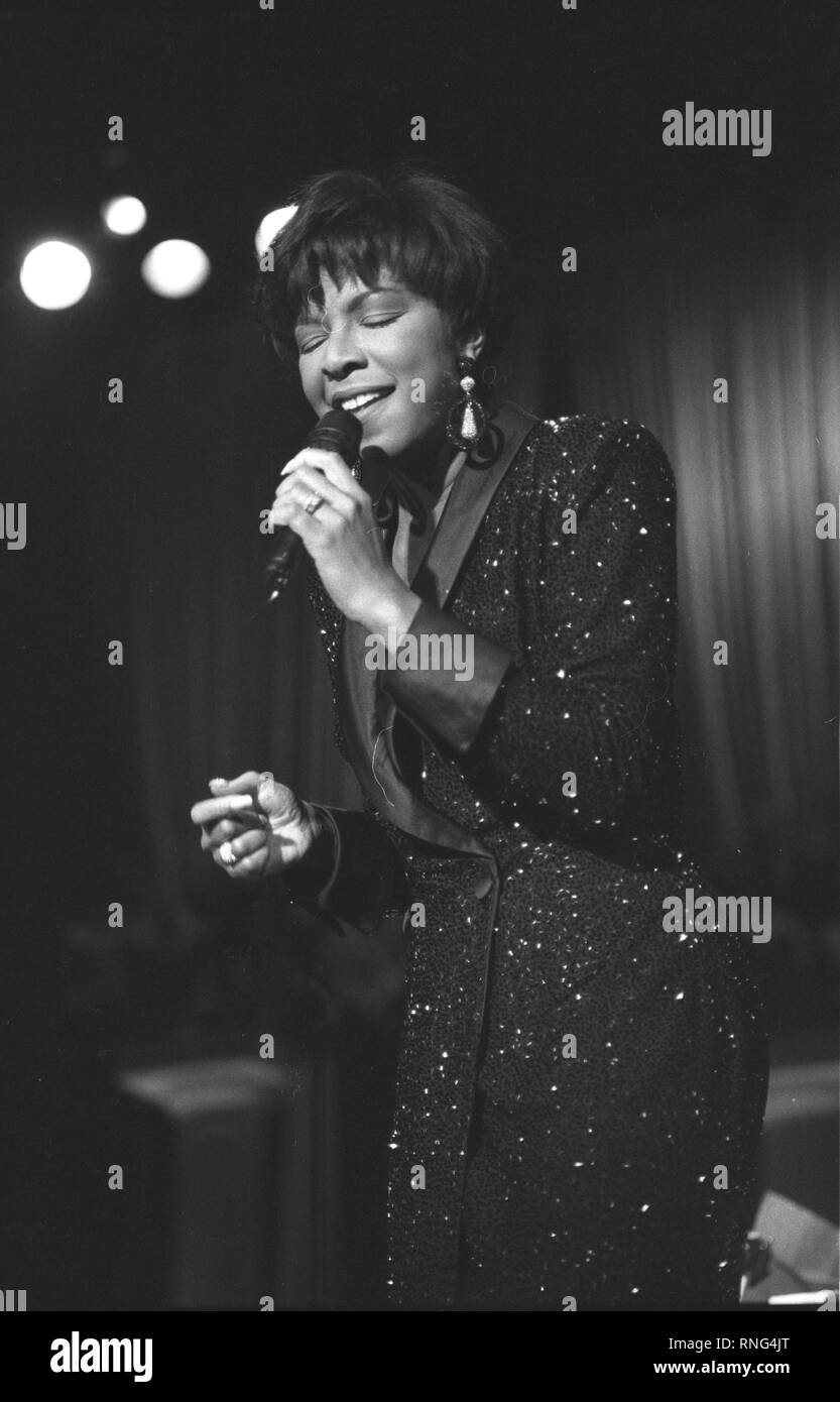 Singer Natalie Cole is shown performing on stage during a "live ...