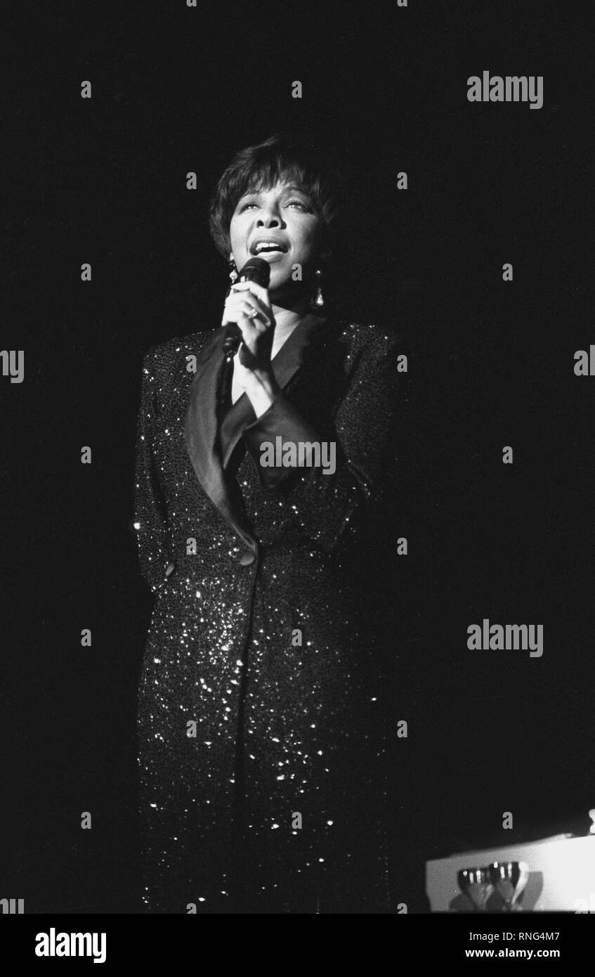 Singer Natalie Cole is shown performing on stage during a "live ...