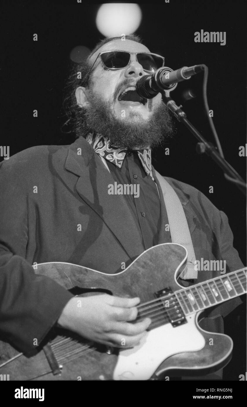 Singer and songwriter Elvis Costello is shown performing on stage ...