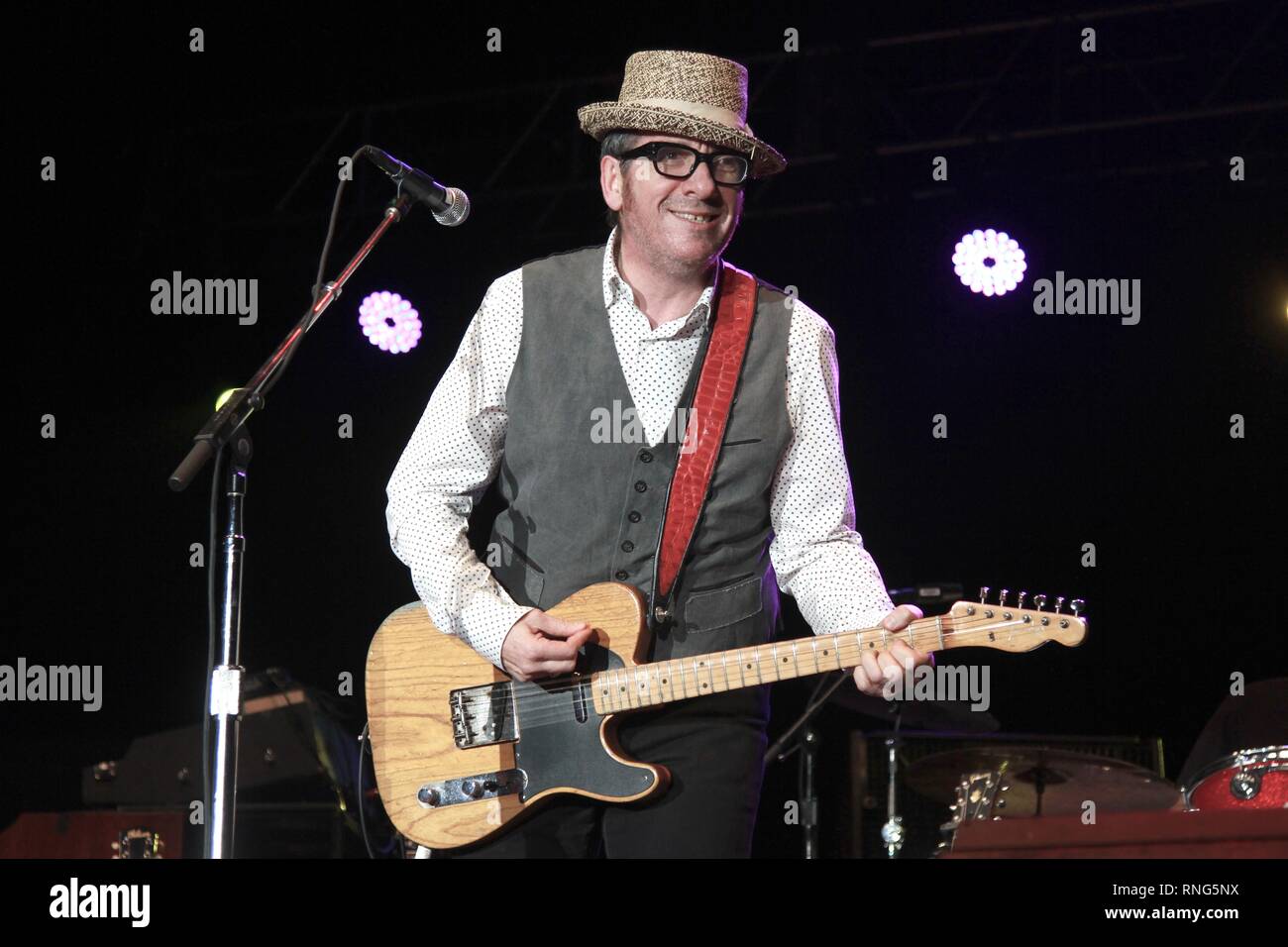 Singer and songwriter Elvis Costello is shown performing on stage ...