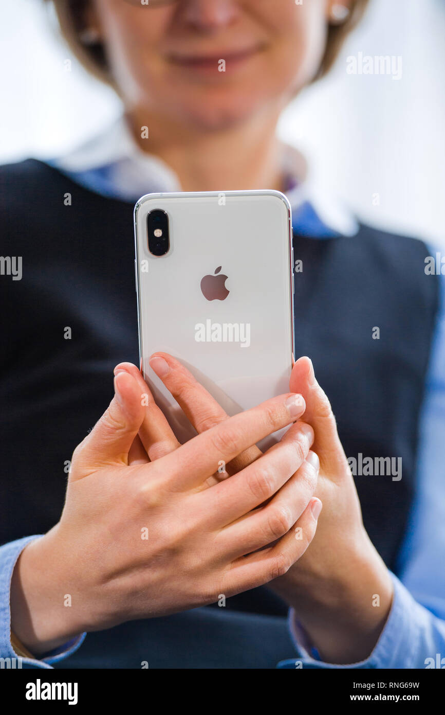 PARIS, FRANCE - OCT 2, 2018: Happy business woman working on the new ...