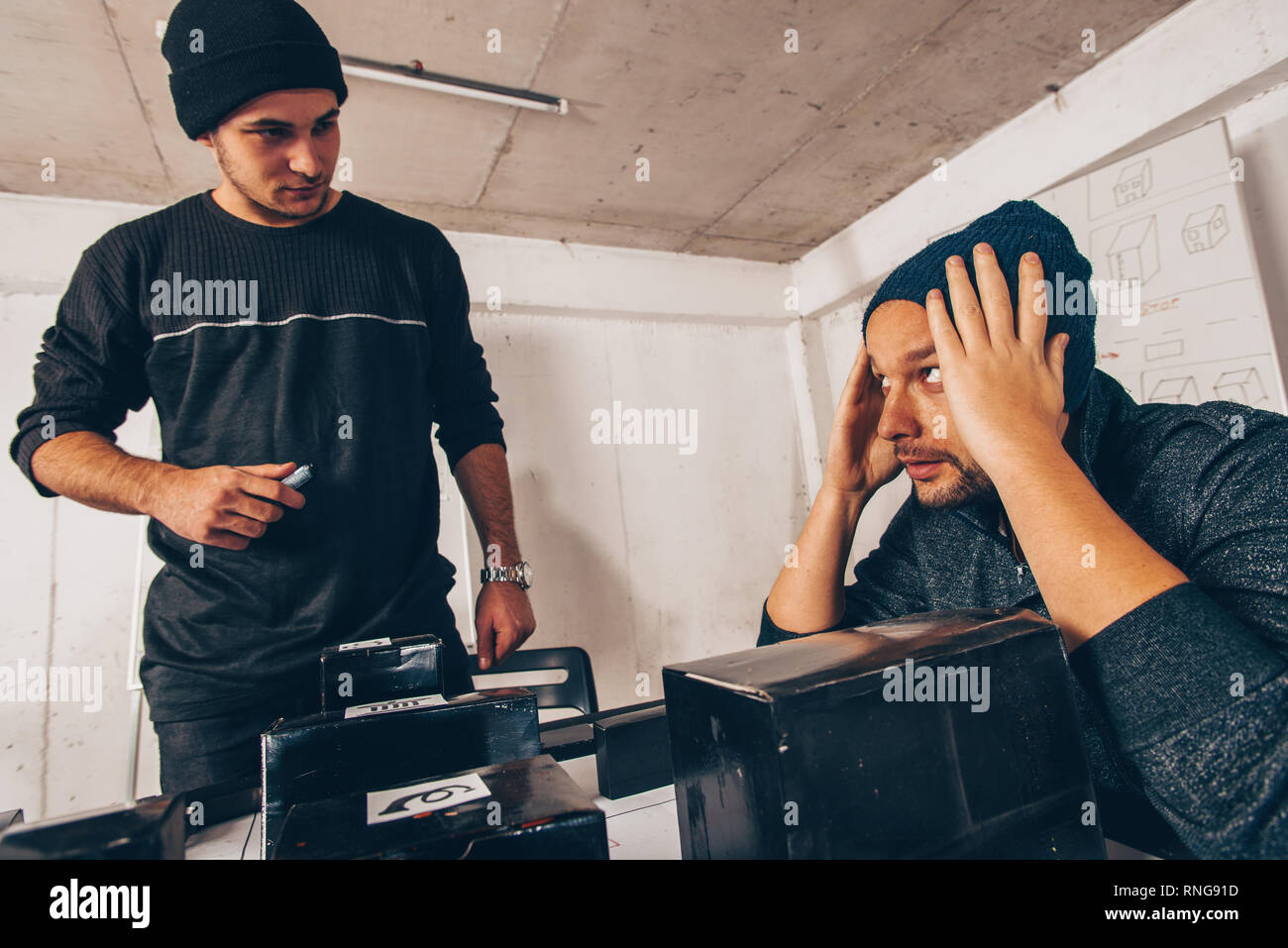 Two gangsters planning to stealing money from bank vault Stock Photo ...