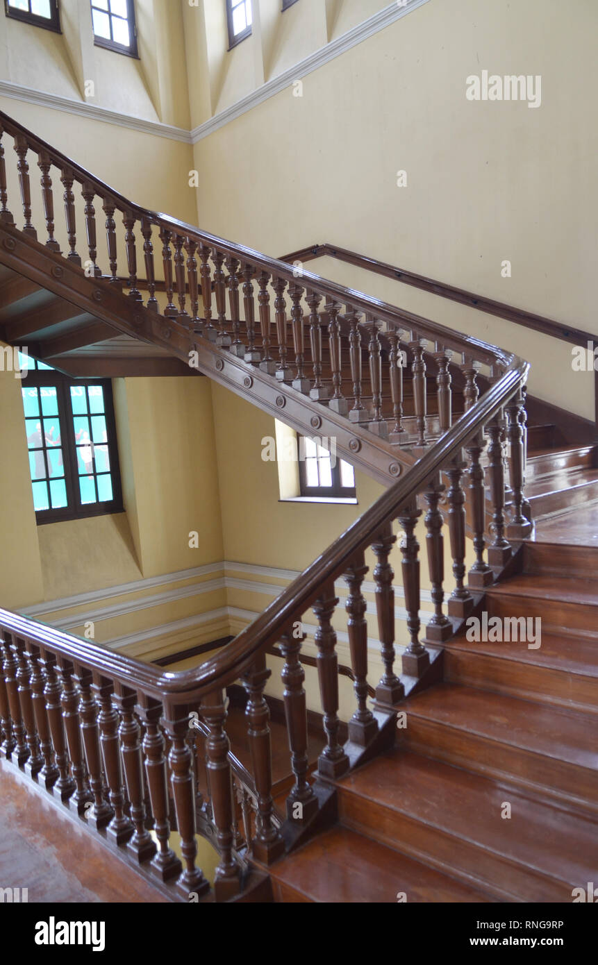Winding wood staircase in building Stock Photo - Alamy