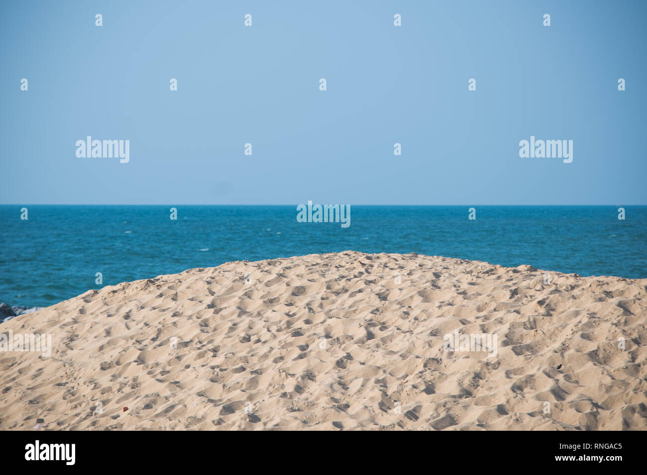 Beach Scene With Sand Blue Water Stock Photo - Alamy