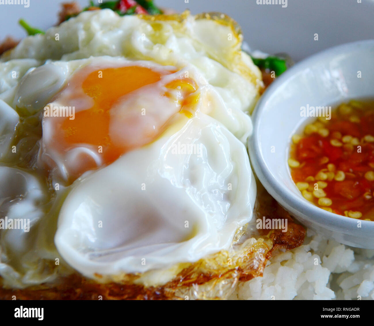 close-up of fried egg and Thai rice Stock Photo - Alamy
