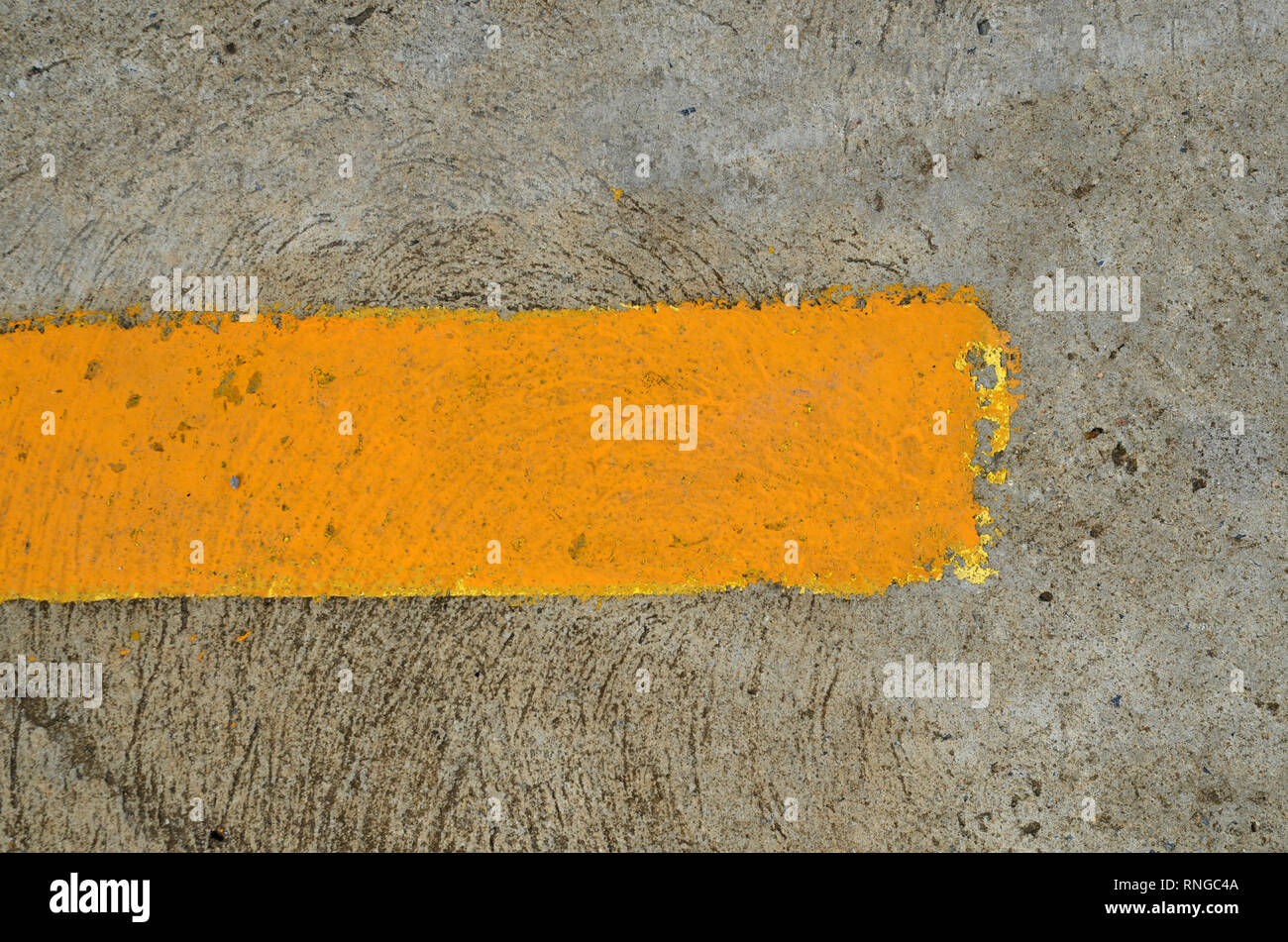 part of yellow arrow on the road Stock Photo - Alamy
