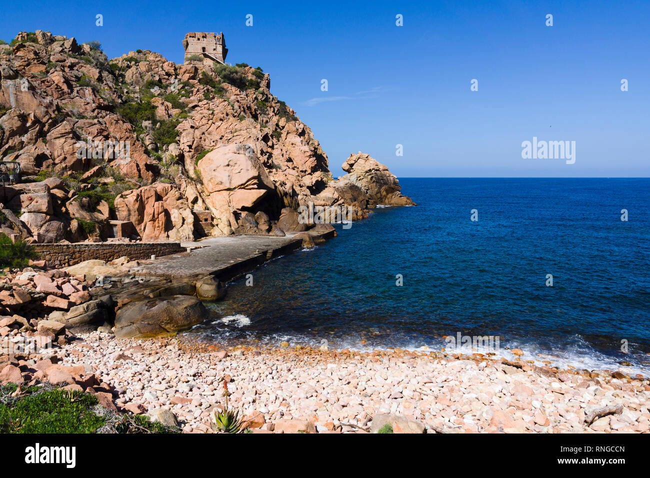 Torra di Portu, ruined Genoese Tower on a rocky outcrop in the Gulf of ...