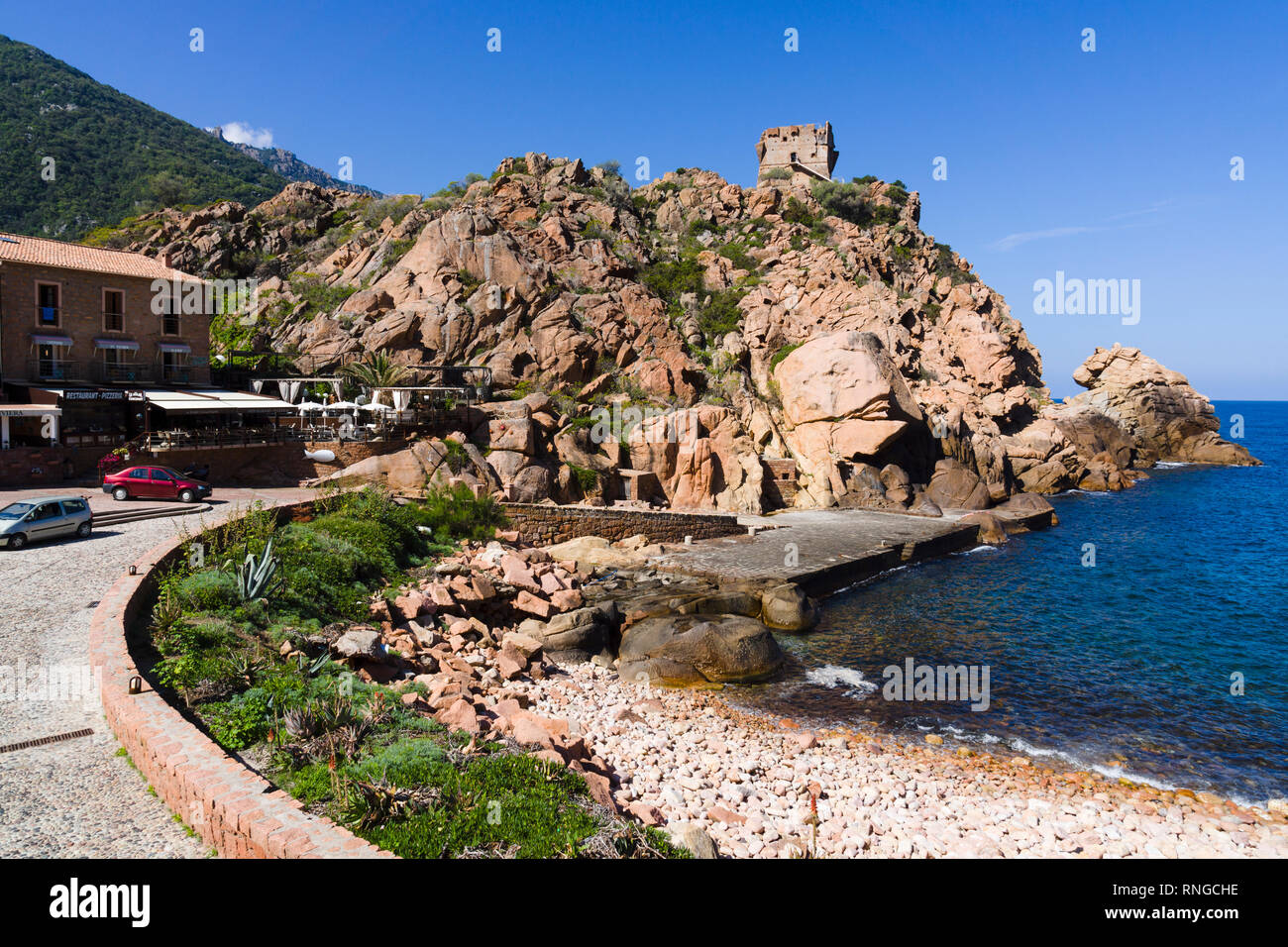 Torra di Portu, ruined Genoese Tower on a rocky outcrop in the Gulf of ...