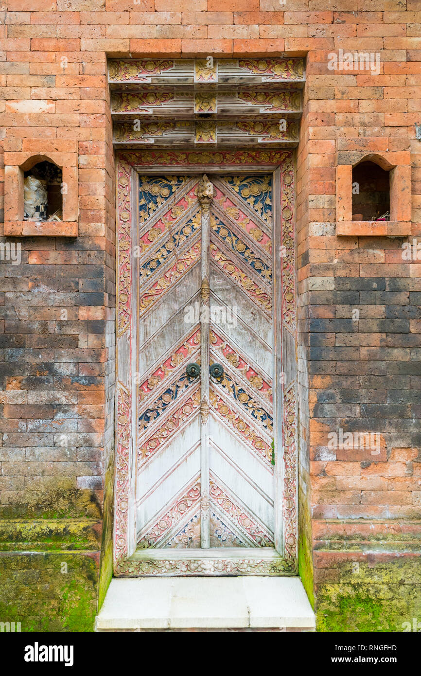 Balinese wood carved doors with traditional local ornaments. Local ...