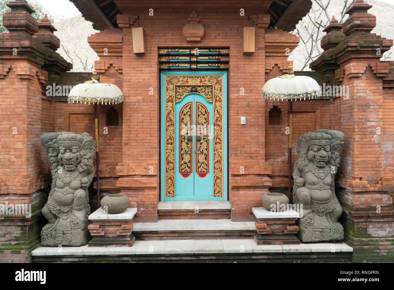 Balinese wood carved doors with traditional local ornaments. Local ...