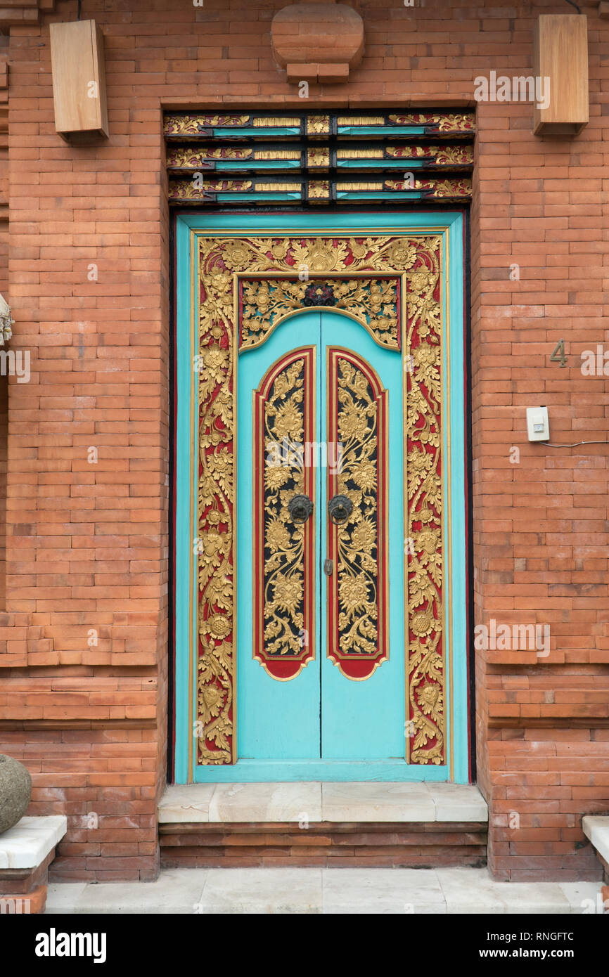 Balinese wood carved doors with traditional local ornaments. Local ...