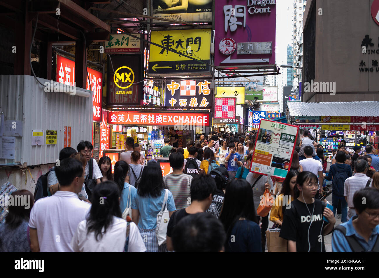 Busy streets packed with People. Hong Kong is one of the most densely ...
