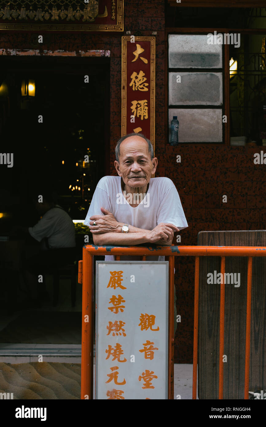 Very friendly and relaxed man in Hong Kong Stock Photo - Alamy