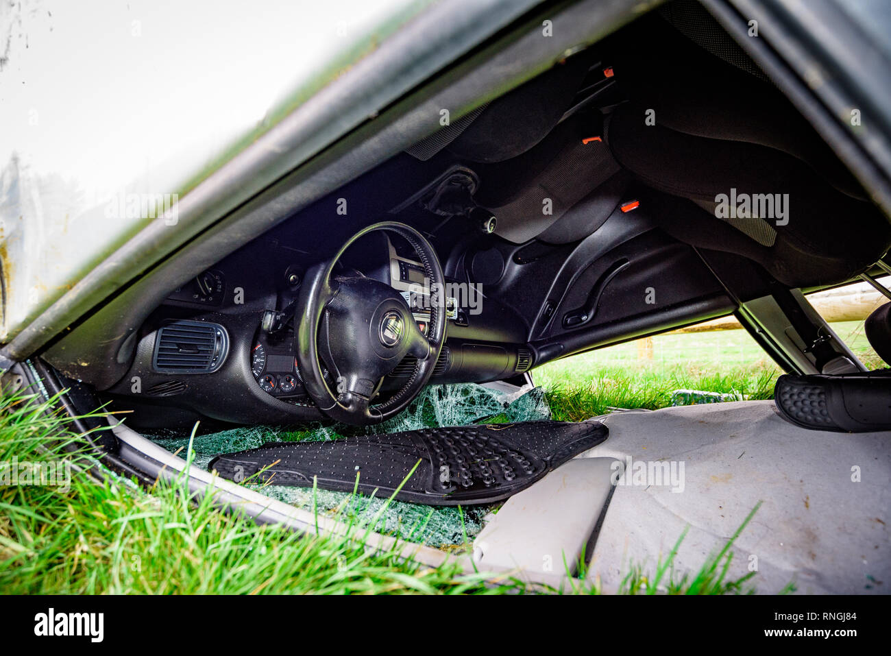 Car Crash and Car Damage. Vehicle in a field after high speed crash ...