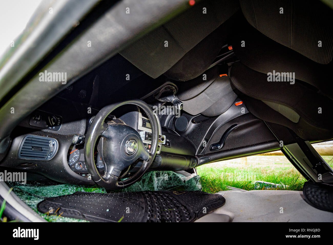 Car Crash and Car Damage. Vehicle in a field after high speed crash ...